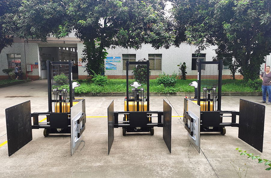 powered counter-balanced stacker with box clamp