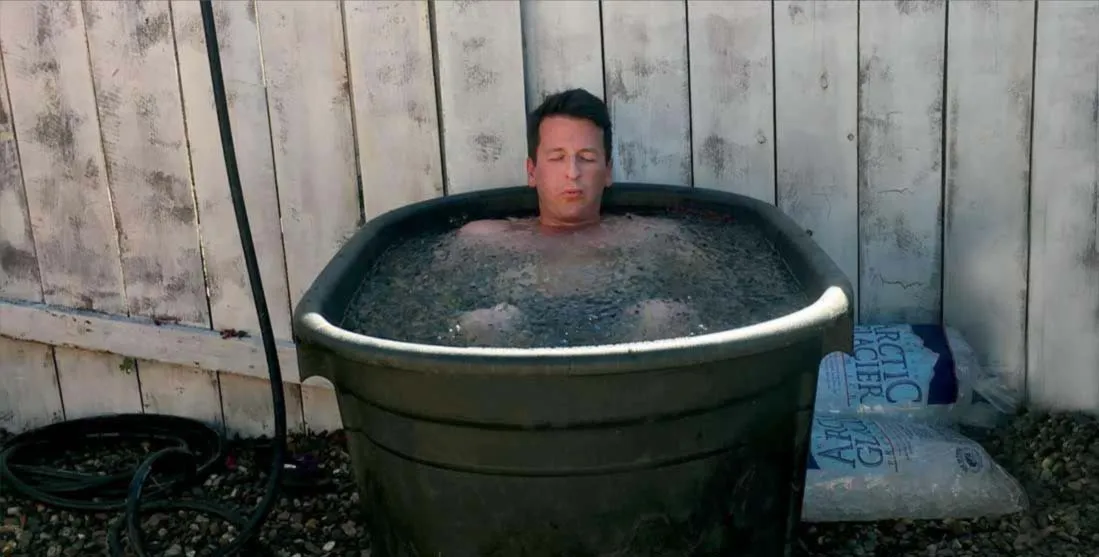 How long should a novice stay in the ice bath for the first time?
