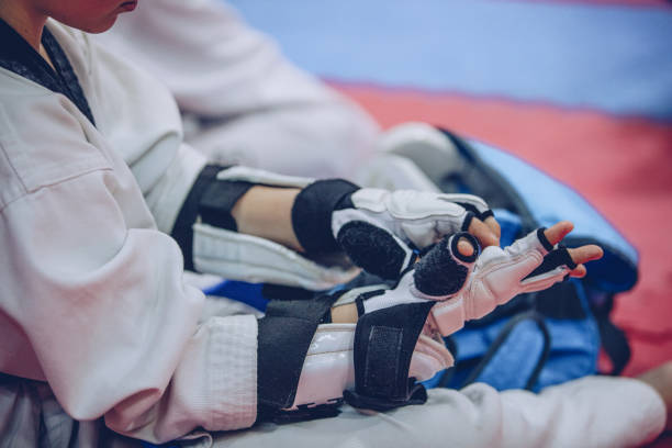 Why Do Thai Fighters Guard with Forearms Out